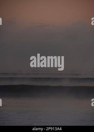 Sea mist appears in between waves as temperatures plummet to -5 in ...