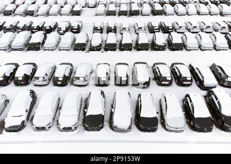 Hundreds of used cars covered in snow in Corby, Northamptonshire ...