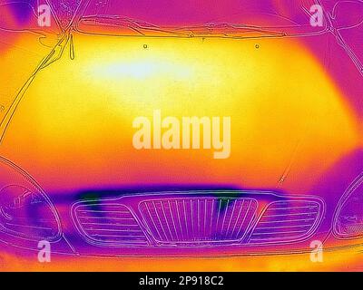 An ordinary car captured on thermal imager. The hood of a car that ...