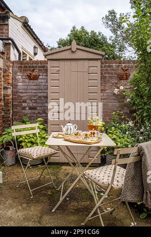 Secluded courtyard garden of 19th century Norfolk cottage, UK Stock ...