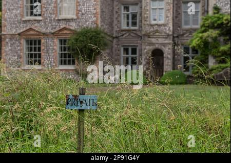 Private grounds of flint exterior of 17th century Jacobean manor house ...
