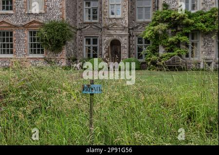 Private grounds of flint exterior of 17th century Jacobean manor house ...