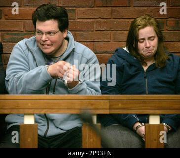 Michael Riley, 34, and his wife, Carolyn Riley, 32, are shown in ...