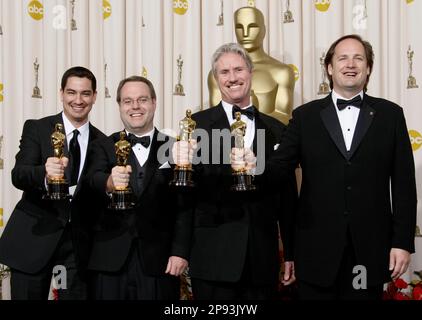 Eric Barba, Steve Preeg, Burt Dalton and Craig Barron hold their Oscars ...