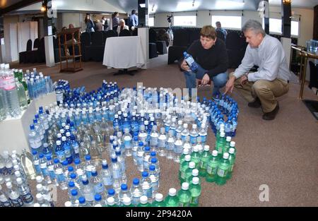 Several drinking water bottles on white background. Eco concept. Copy ...