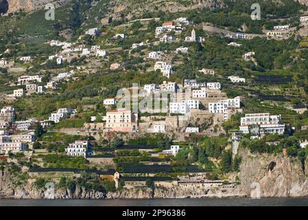 Views of the Amalfi coast with scattered housing and hotels seen from a ...