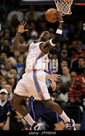 Utah Jazz' Matt Harpring , front, is fouled by Seattle SuperSonics ...