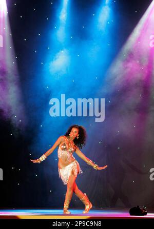 Miss South Africa, Tansey Coetzee, poses in front of the logos of the ...