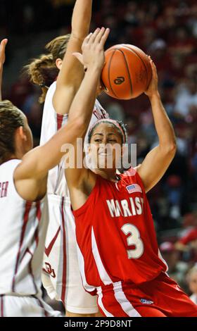 Oklahoma's Whitney Hand, center left, talks with teammates during a ...
