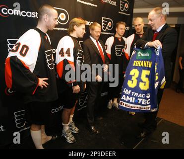 Ambassador of Finland to the US, Pekka Lintu, right, talks to members ...