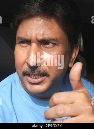 Salim Malik, Pakistan's former Test cricketer smiles as he talks on a ...