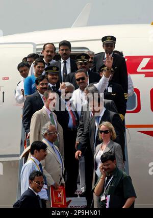 Chairman, Jet Airways, Naresh Goel, left, shows his newly acquired ...