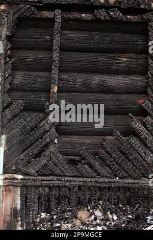 Burned wooden house, devastated construction and green grass Stock ...