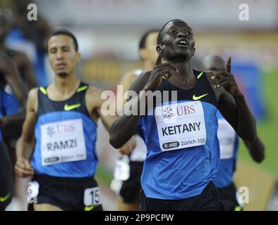 Gold medalist Rashid Ramzi of Bahrain celebrates his medal during the ...