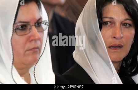 Maha al-Khatib, Jordanian Minister of tourism, left, speaks with the ...