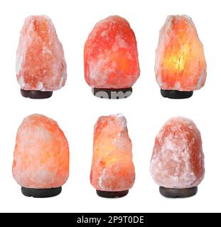 Set with pink Himalayan salt lamps on white background. Banner design ...