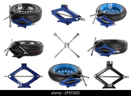 Set with scissor jacks, cross torque wrenches and wheels on white ...