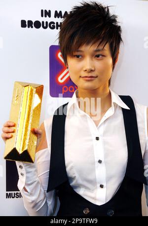 Chinese singer Li Yuchun poses during the 2018 Sohu Fashion Awards ...