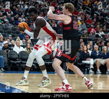 Arizona Wildcats center Oumar Ballo (11) scores on USC Trojans forward ...