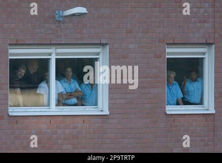 Wardens in a maximum security prison take selfies with a prisoner with ...