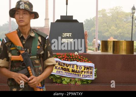 Relatives of martyrs of the 1999 India-Pakistan Kargil war look on ...