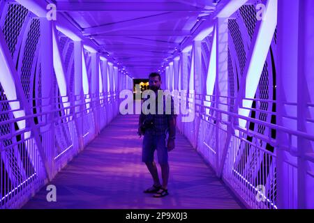 people silhouettes in fluorescent city lights Stock Photo - Alamy