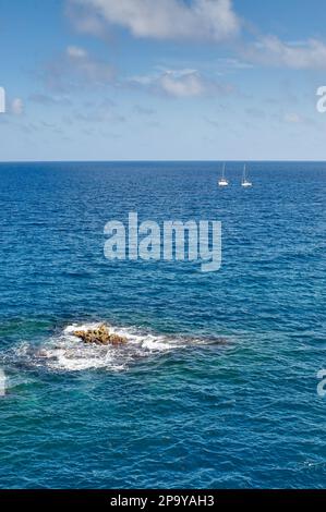 Photo of two beautiful sailboats crossing the open sea Stock Photo - Alamy