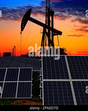 Oil pump with solar panels, industrial equipment Stock Photo - Alamy