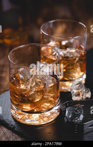 black slate board on a wooden background Stock Photo - Alamy