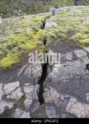 Fissure caused by volcanic eruption, crater landscape Tjarnargigur ...