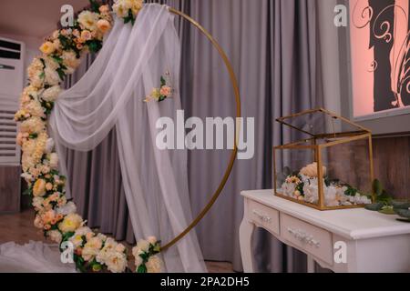 Wedding ceremony set up. Trendy wedding arch made with flowers and ...