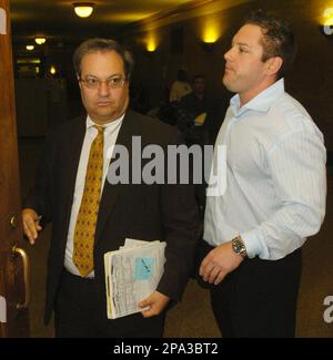 Denver Broncos punter Todd Sauerbrun takes a snap from a machine during ...