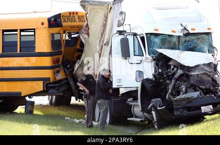 School bus involved in an accident left with a gaping hole and extreme ...