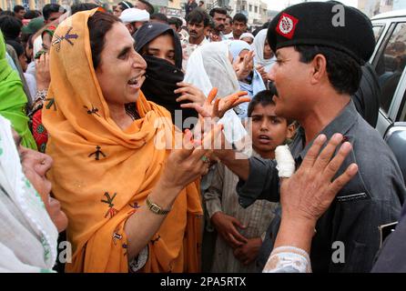 Pakistani women living in a troubled neighborhood in Karachi's Lyari ...