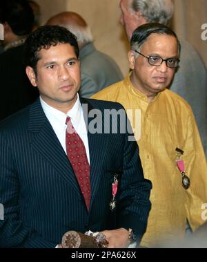 Founder of Infosys Technologies,N.R. Narayana Murthy, left is seen with ...