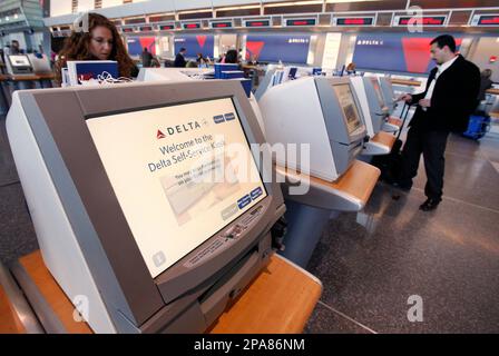 Delta Airlines self-service check-in kiosks at the International ...