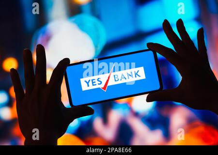 In this photo illustration, the Yes Bank Limited logo seen displayed on ...