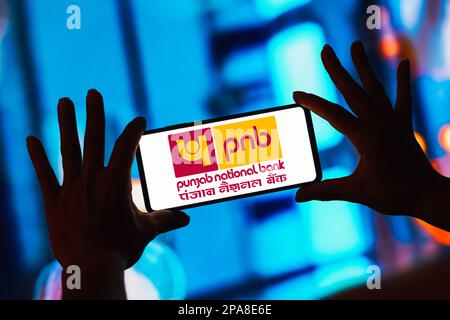 In this photo illustration, the PNB (Punjab national bank) logo is seen ...