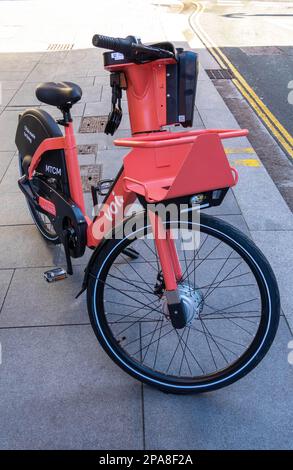Liverpool, England, Uk. Electric bike and scooters for hire Stock Photo ...