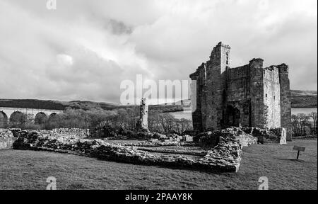 A majestic old Edlingham Castle situated on a sprawling landscape in ...