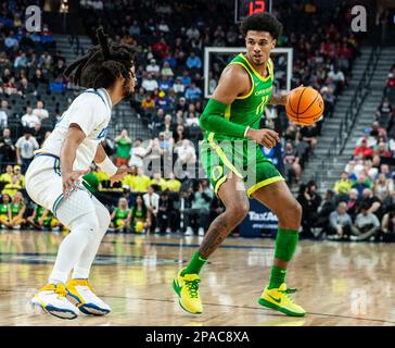 Oregon guard Rivaldo Soares (11) and Colorado forward Tristan da Silva ...