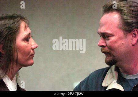 Jamie Bolin's mother Jennifer, left, hugs juror Claudette Brumit ...