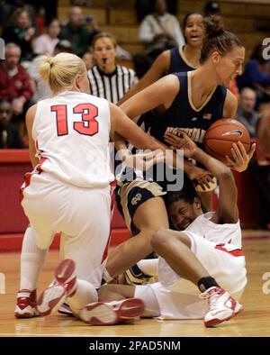 St. John's Tiina Sten, right, of Turku, Finland, goes for a loose ball ...