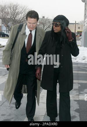 Tamika Riley, right, arrives at the U.S. District Courthouse in Newark ...