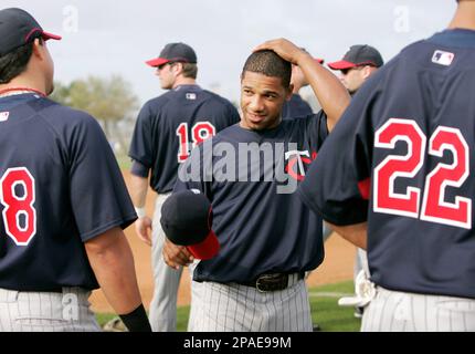 Minnesota Twins' Matt Macri, left, beats the tag by Arizona ...