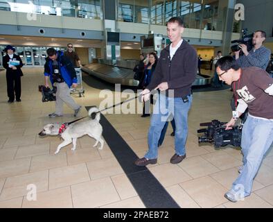 Major Brian Dennis and Nubs The Dog arrives at The 24th Genesis Awards ...