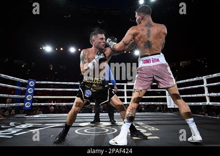 Koen Mazoudier (left) and Ben Mahoney in action during the undercard ...