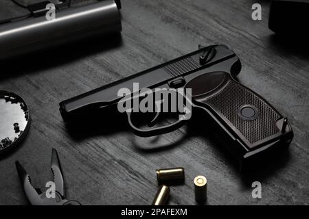 Standard handgun on dark background. Semi-automatic pistol Stock Photo ...