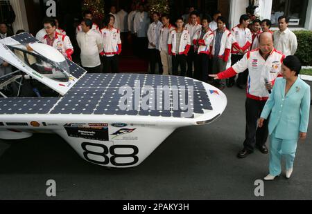 A Philippine-made solar-powered car named "Sinag" is driven around the ...