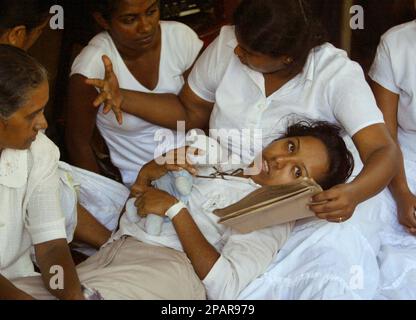 12 year old tamil tiger learning to strip and assemble his ak 47 gun ...
